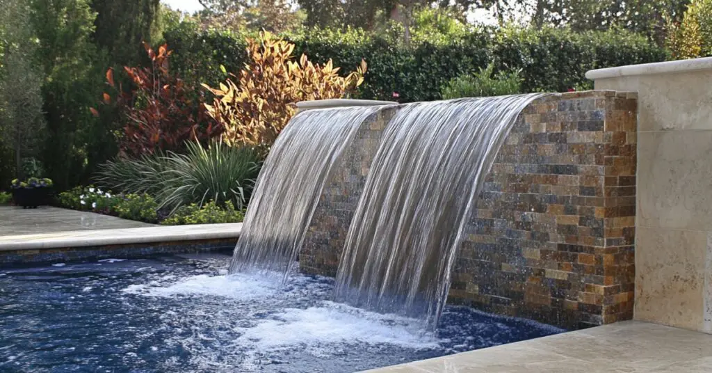 7 Luxury Pool Waterfall Ideas For Texas Outdoor Living